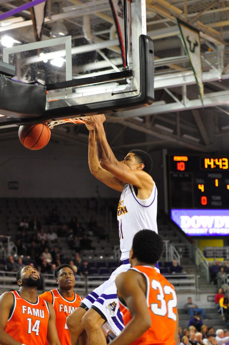 Andre Washington jams for East Carolina. (Al Myatt photo)