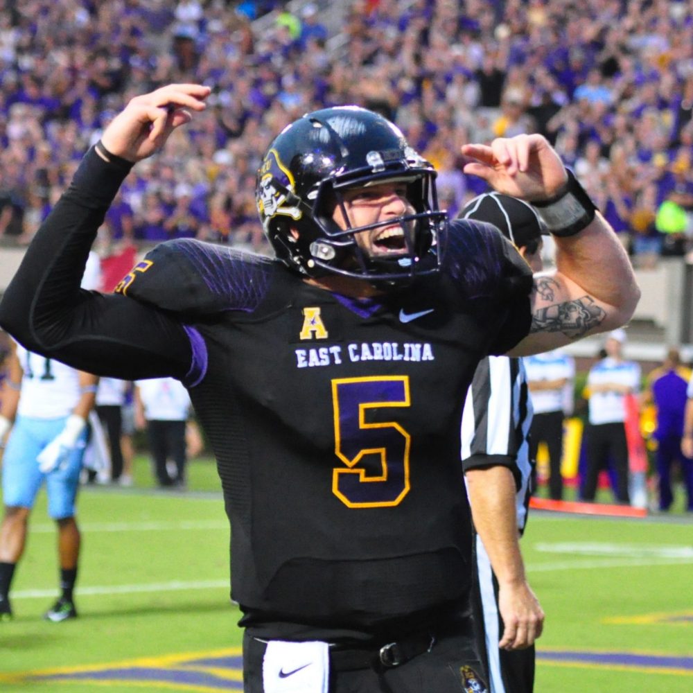 ECU QB Shane Carden celebrates after scoring a short rushing touchdown ...