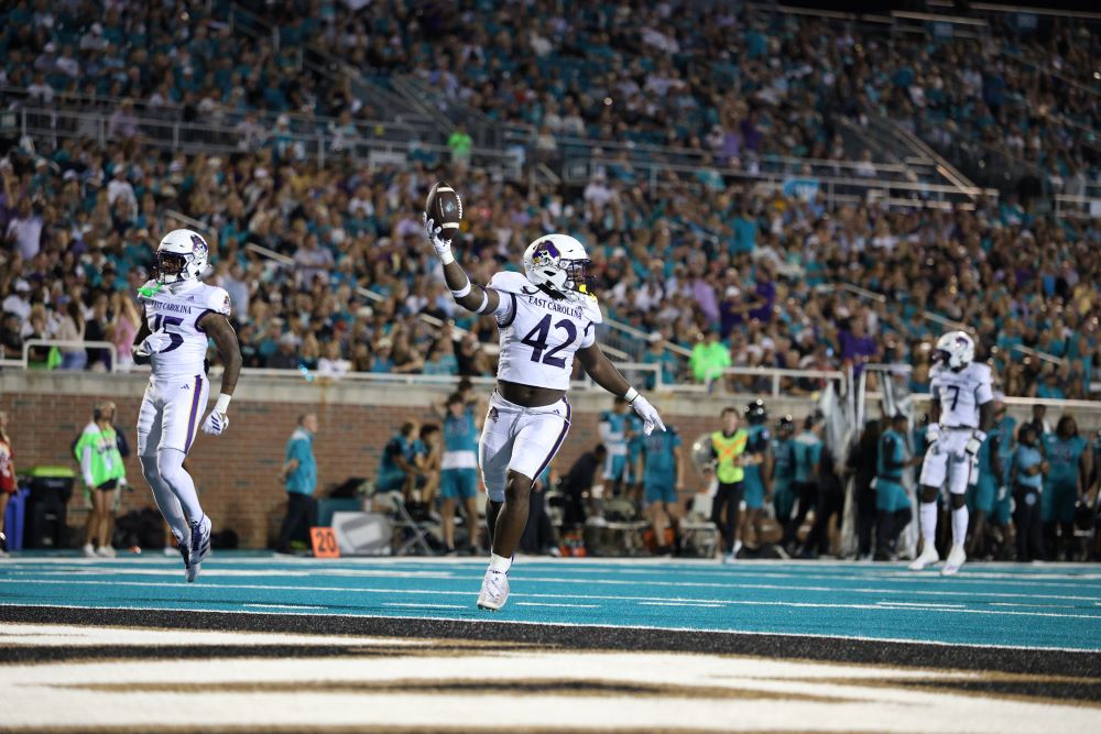 Pirates crash blackout party at Coastal, 38-0